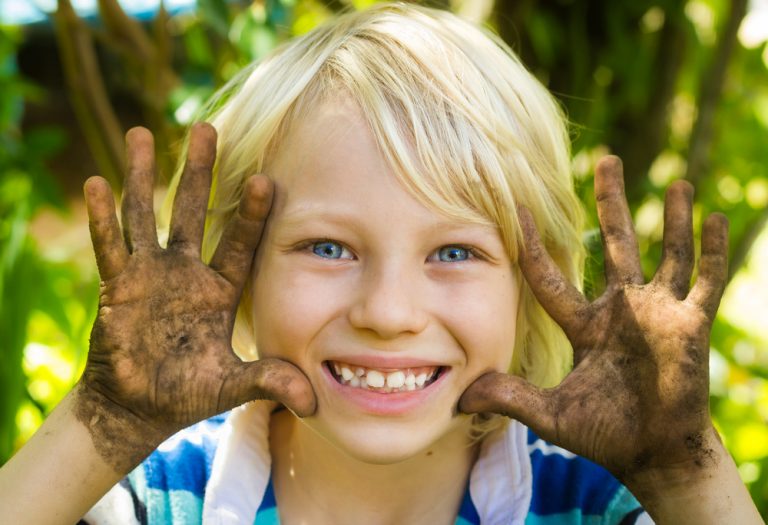 Why is it important to let your kid play in the mud?